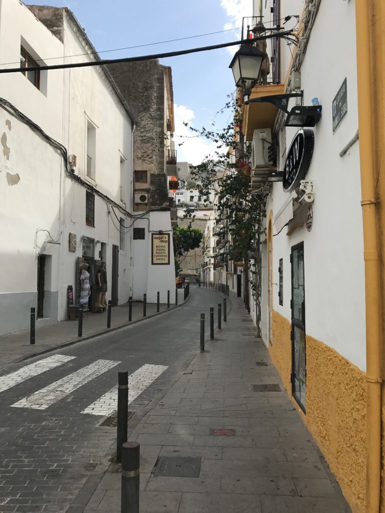Narrow Alley Street With A Small Shop And Pedestrian Crossing - The ...